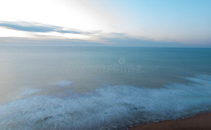Beautiful Scenery of the Sunset Over the Peaceful Sea Stock Photo ...