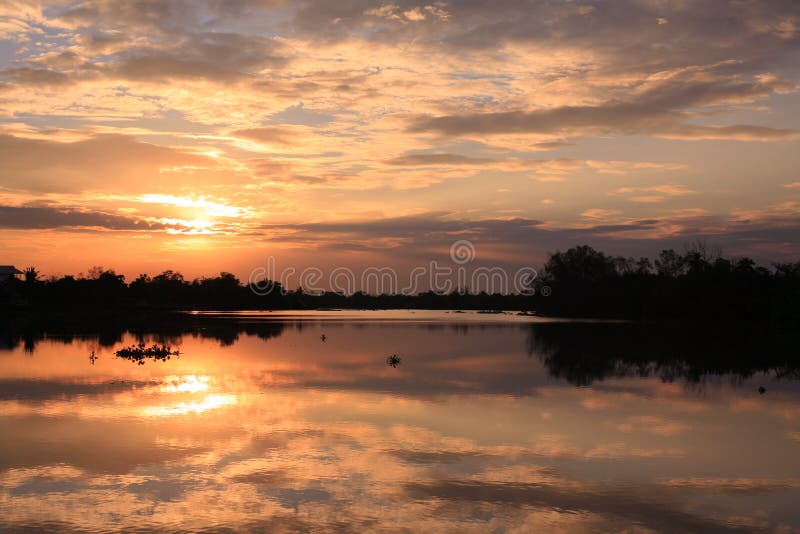 Beautiful scenic of sunset stock image. Image of float - 27687049