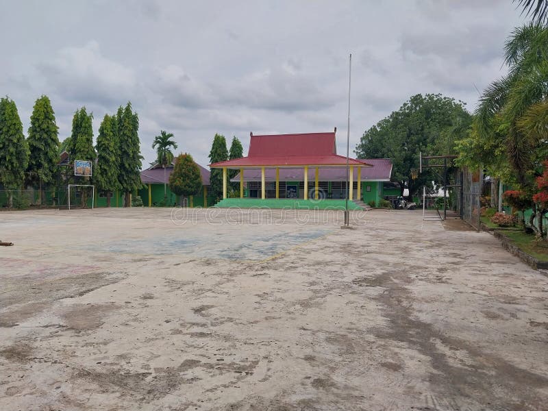 The Beautiful School Yard is Surrounded by Trees and Greenery Stock ...