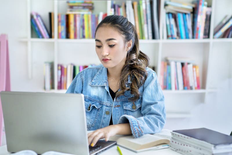 Beautiful Schoolgirl in Library Stock Photo - Image of geek, childhood ...