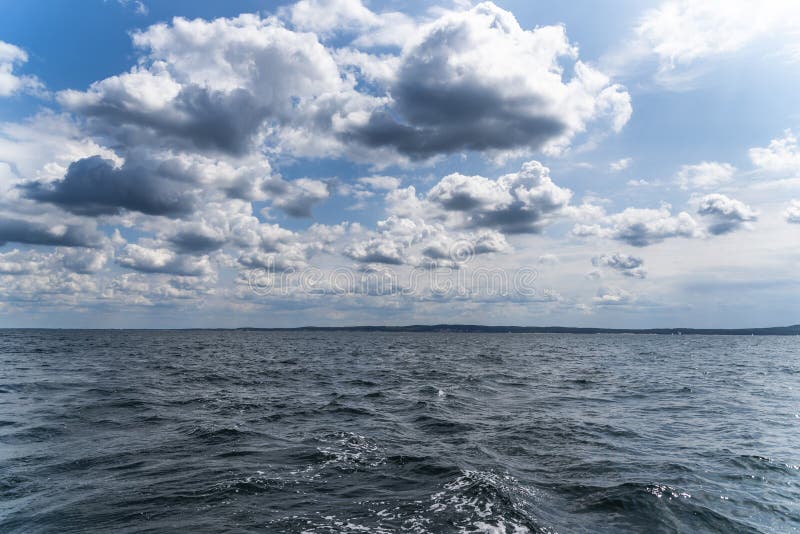 Beautiful Sea Landscape. Calm Ocean and Clouds in the Sky Stock Photo ...
