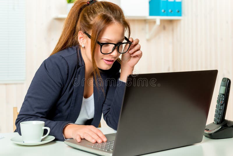 Beautiful Secretary Carefully Scans Email on the Computer Stock Image ...