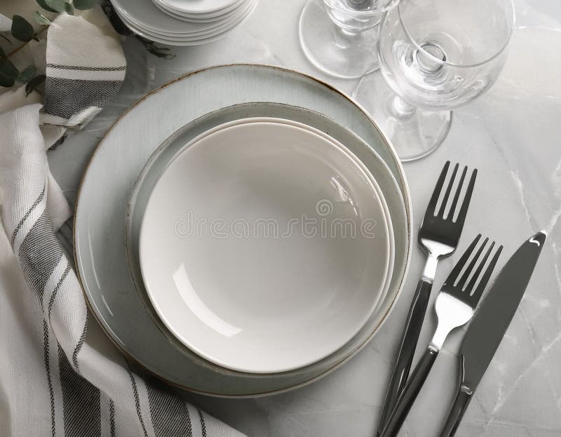 Elegant Set of Clean Tableware on Light Grey Marble Table Stock Image ...