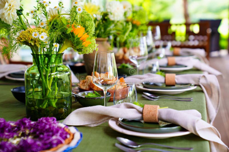 Beautiful Setting of a Large Table with Flowers. Stock Photo - Image of ...