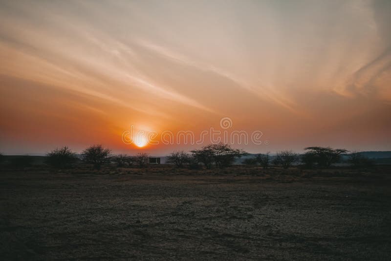 Beautiful Setting Sun Over a Field on a Kenyan Safari Stock Photo ...