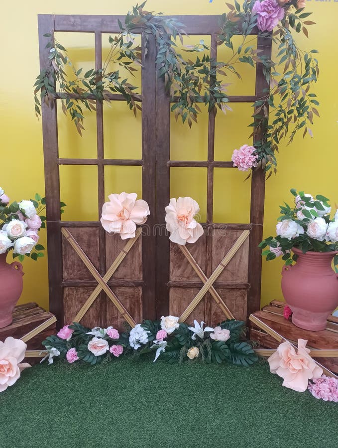 A Beautiful Setup of a Studio Setup with Pink Flowers for Background ...