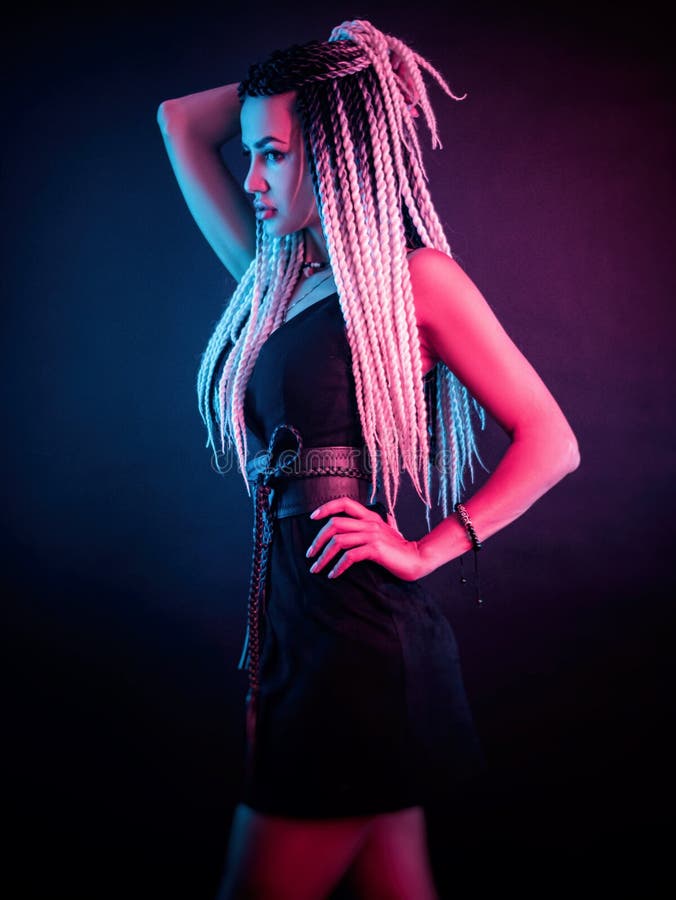 Beautiful Girl with Long Dreadlocks Posing in Neon Light Stock Image ...