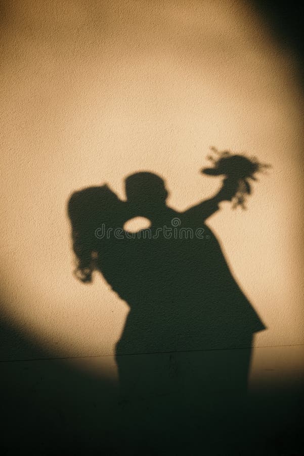 Beautiful Shadow of a Kissing Couple on a Wall Stock Photo - Image of ...