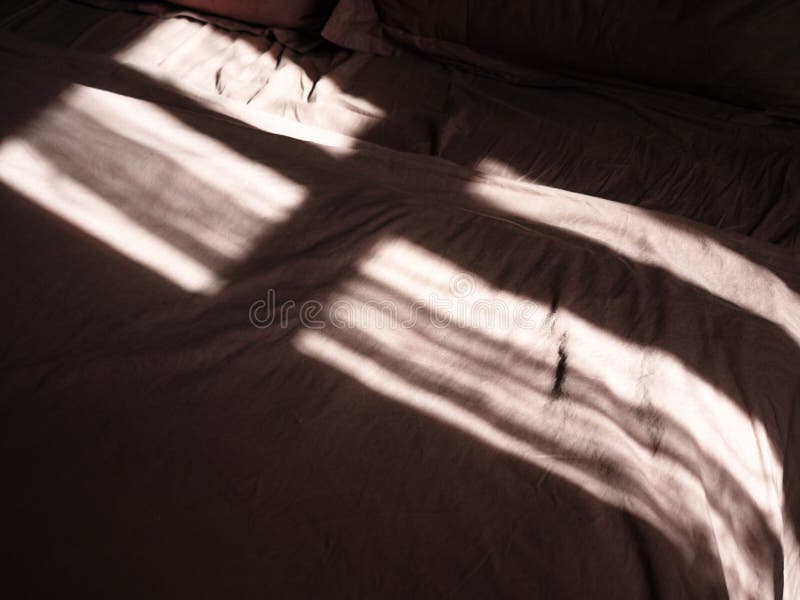Beautiful Shadow from the Window and Hand on the Bed from the Morning ...