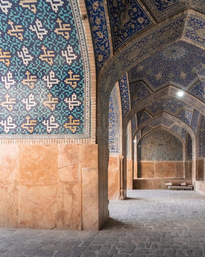 Beautiful Shah Mosque in Isfahan, Iran with Blue and Gold Tile Work ...