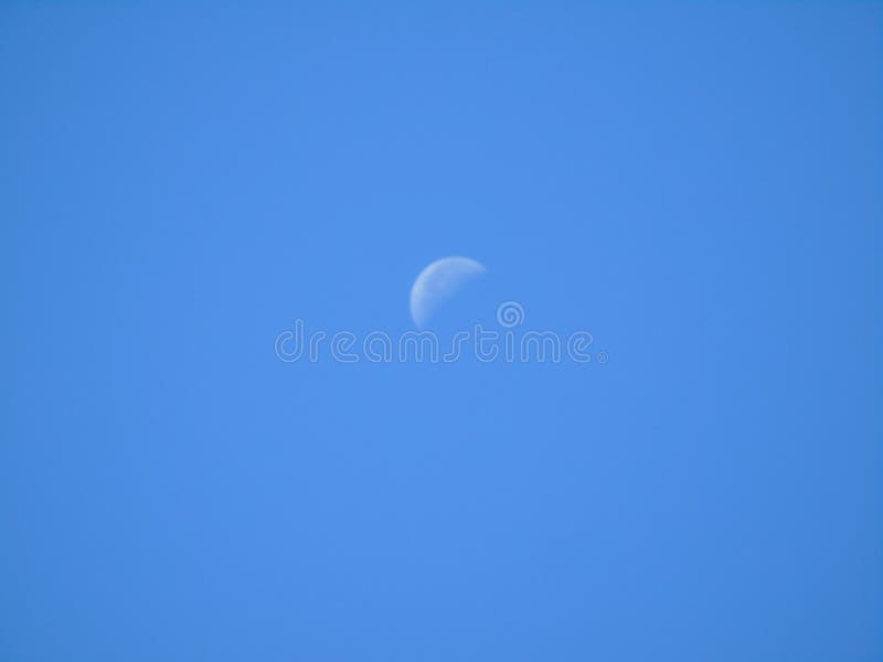 Beautiful Shimmering Half Moon Hiding Behind Creamy Blue Sky Stock ...