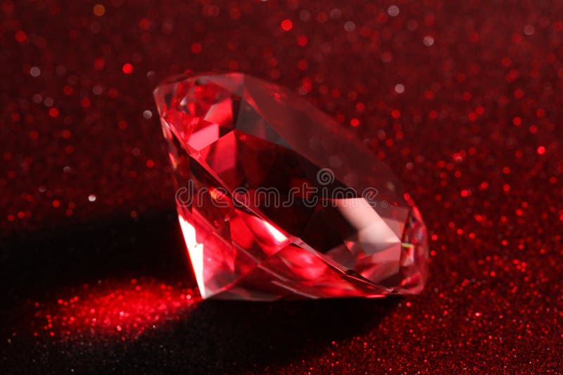 Beautiful Shiny Diamond on Red Glitter Background, Closeup Stock Image ...