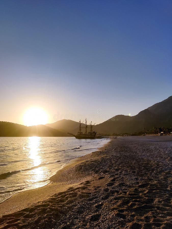 A Beautiful Ship is Sailing in the Blue Sea Stock Photo - Image of wave ...