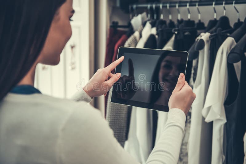 Beautiful shop assistant stock photo. Image of consumerism - 97081580