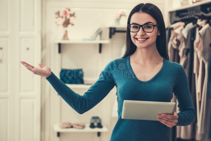Beautiful shop assistant stock image. Image of choice - 97081699