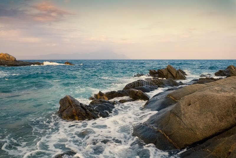 Beautiful shore and rocks stock photo. Image of tropical - 132660348