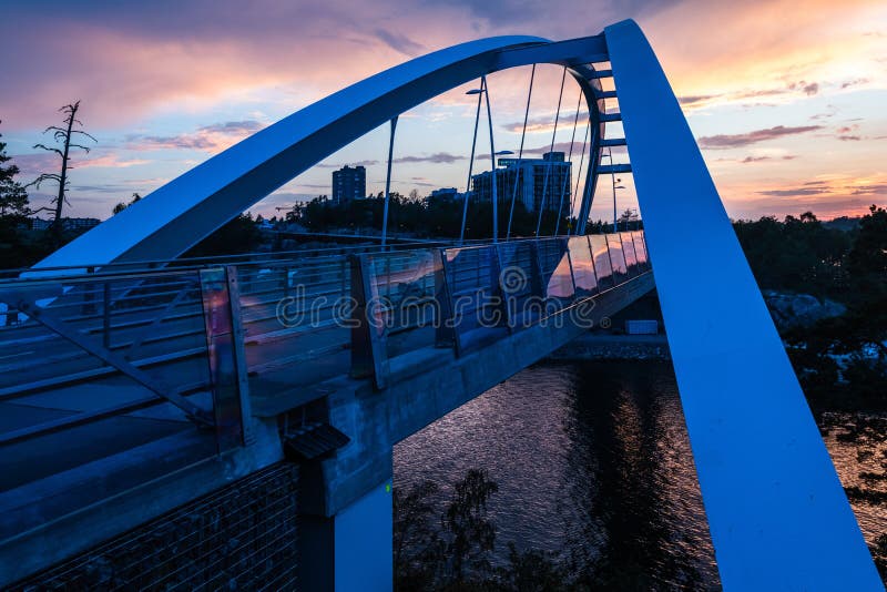 Beautiful Shot of an Arch Suspension Bridge during Sunset Editorial ...