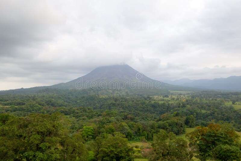 Beautiful Shot of Arenal Volcano Under a Cloudy Sky Stock Photo - Image ...
