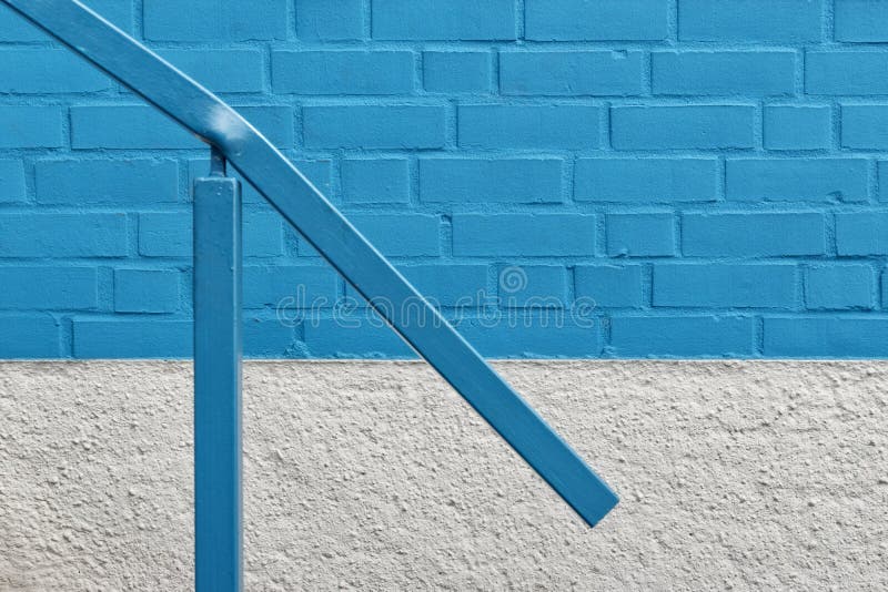 Beautiful Shot of a Blue Iron Railing and a Stone Blue Wall in the ...