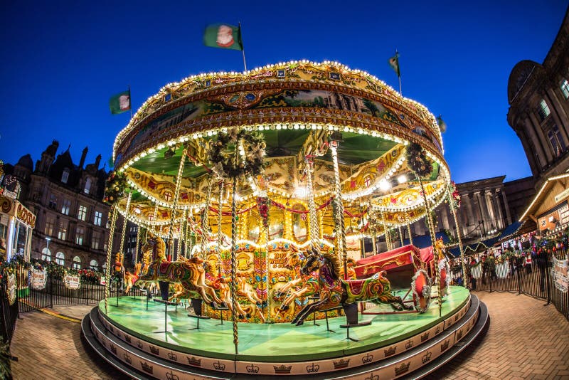 Beautiful Shot of a Child Carousel Surrounded by Buildings in the ...