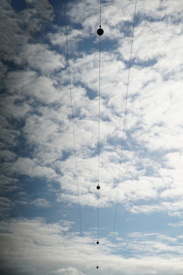 Beautiful Shot of a Cloudy Sky with Electrical Cables in a Daytime ...