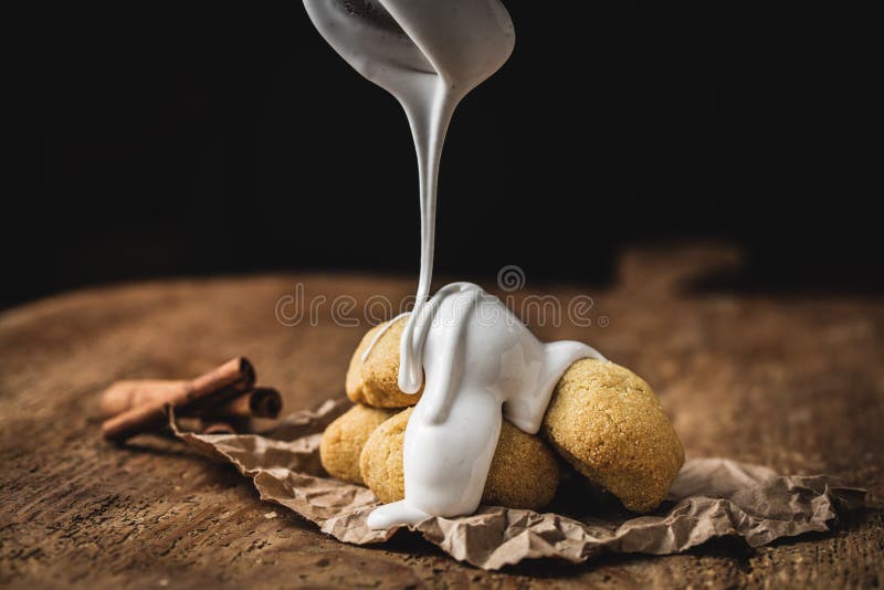 Beautiful Shot of Cream Dripping Over the Cookies from the Spoon Stock ...
