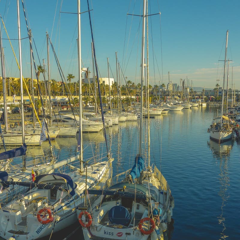 Beautiful Shot of a Dock with Different Sized Boats Parked on the Water ...