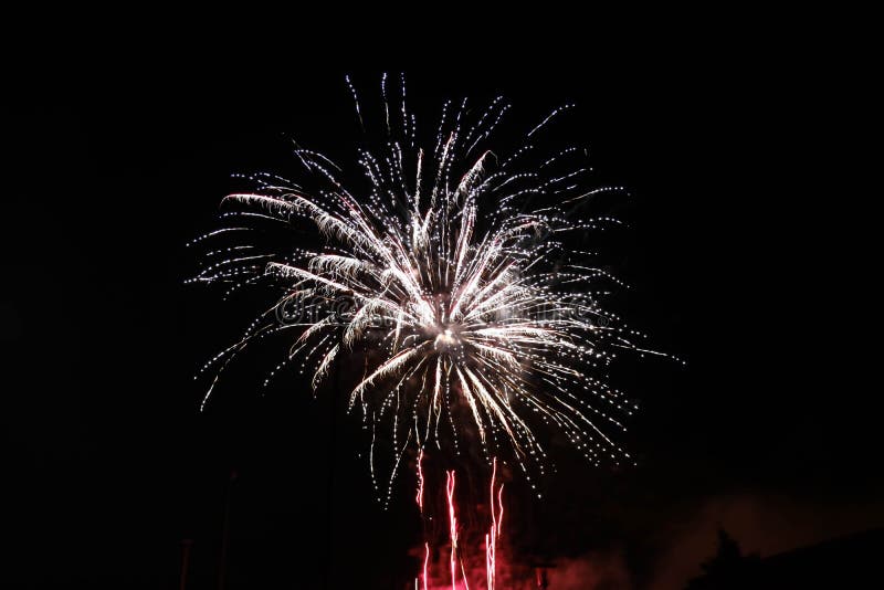 Beautiful Shot of Fireworks Bursting in the Night Sky Spreading a ...