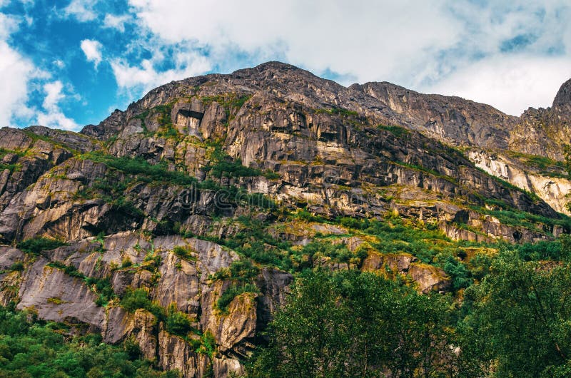 Beautiful Shot of High Rock Formations Covered with Grass in Norway ...