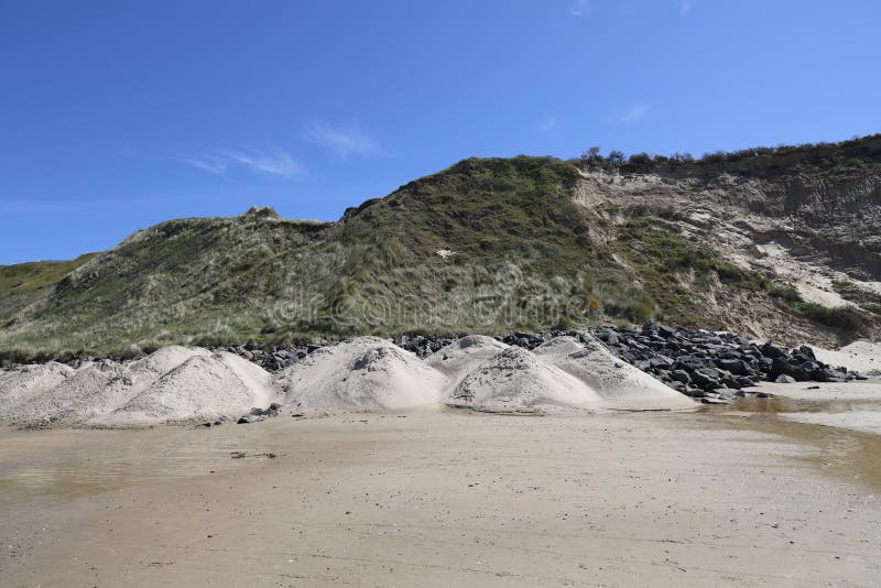 Beautiful Shot of Hills in a Beach in Lonstrup, Denmark Under the Blue ...
