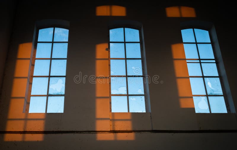 Beautiful Shot of the Huge Windows of the Building with the Sun Rays ...