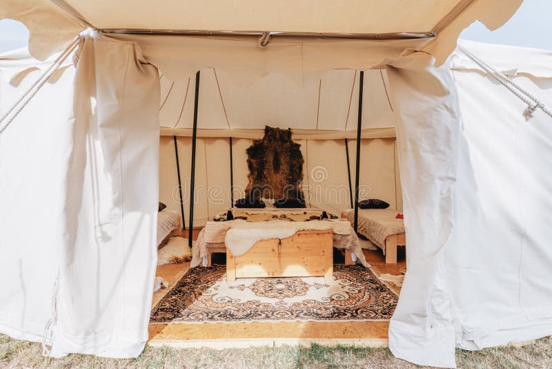 Beautiful Shot of the Interior of a Rustic-style Tent with Beds for ...