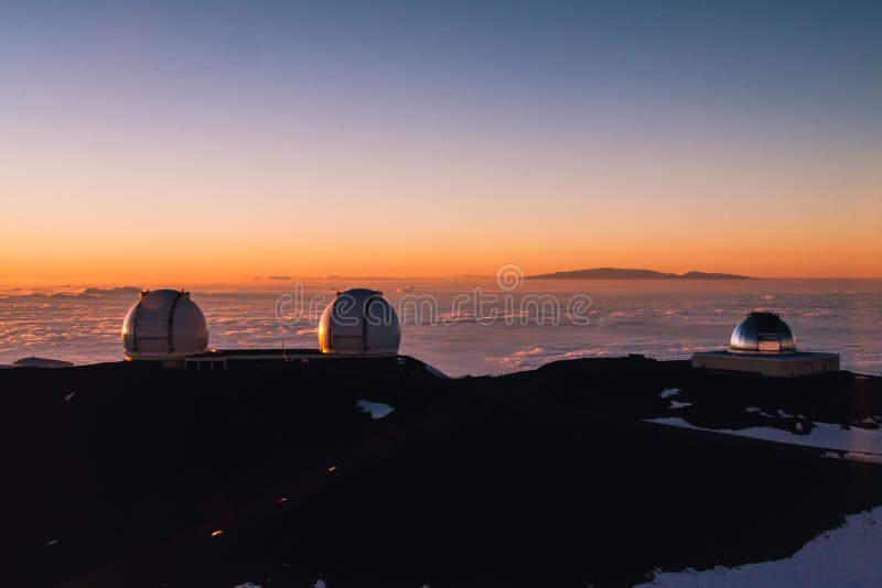 Beautiful Shot of the Mauna Kea Observatories on a Seaside at Sunset ...