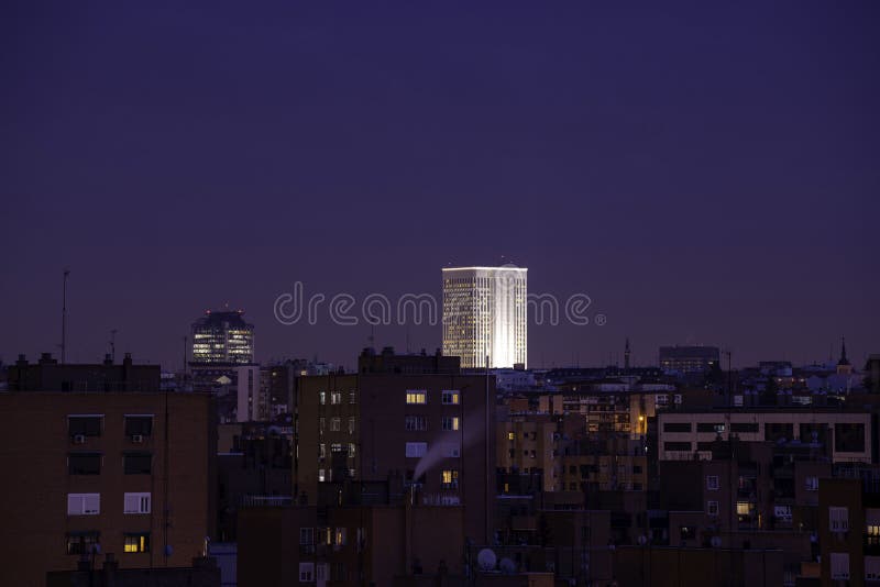 Beautiful Shot of a Night Cityscape with a White Tall Building ...