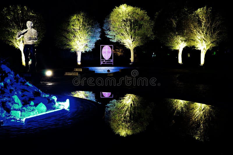 Beautiful Shot of a Night View at a Park with a Lake Reflecting the ...