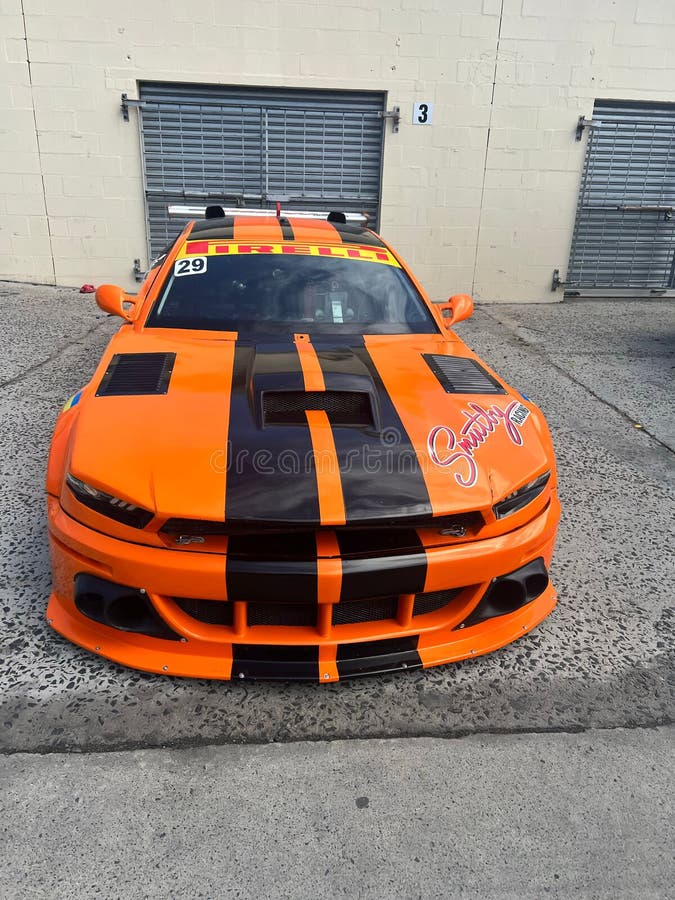 Beautiful Shot of an Orange Racing Car Editorial Photography - Image of ...