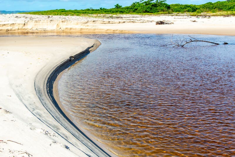 Beautiful Shot of Red Water of a River on Guaibim Beach Stock Image ...