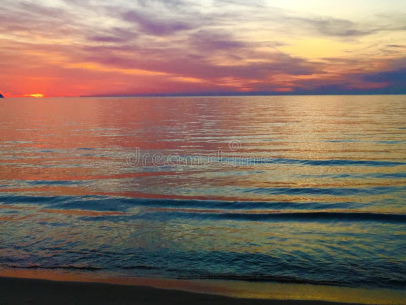 Beautiful Shot of a Sunrise Scenery of a Calm Ocean Stock Image - Image ...