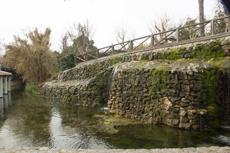 Beautiful Shot of a Tall Stone Border of a River on a Cloudy Weather ...