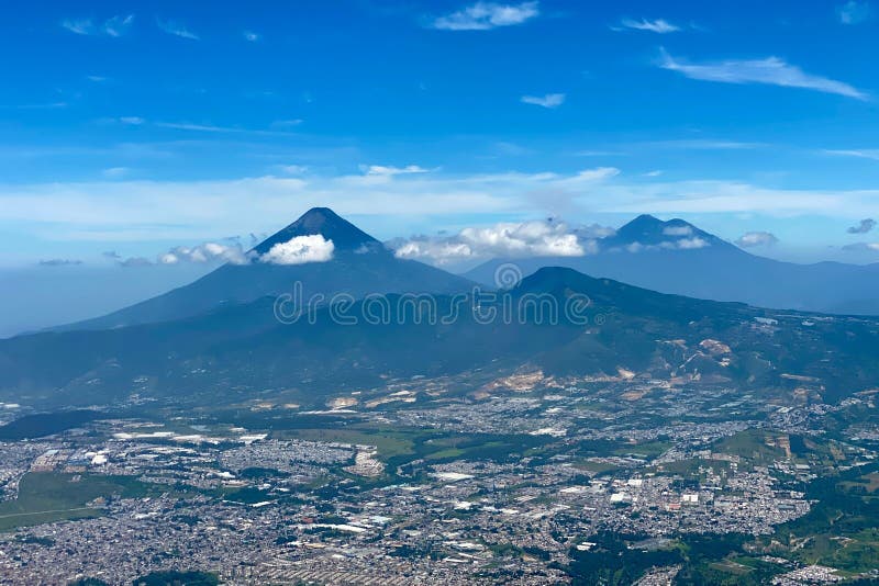 Beautiful Shot of the Volcano of Guatemala Under the Clouds Stock Image ...