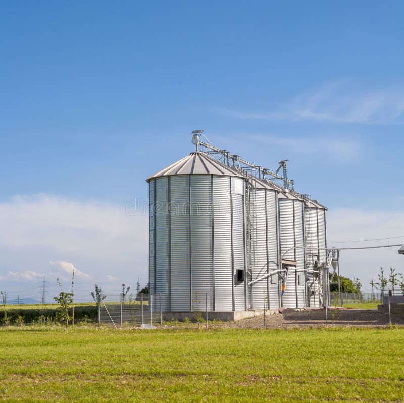 Beautiful Silver Silos in Field Stock Photo - Image of acre, field ...