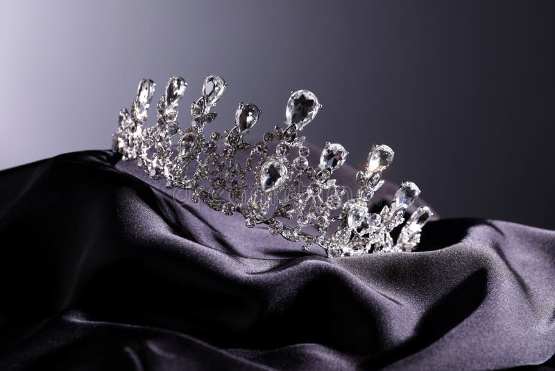 Beautiful Silver Tiara with Diamonds on Dark Cloth Against Grey ...