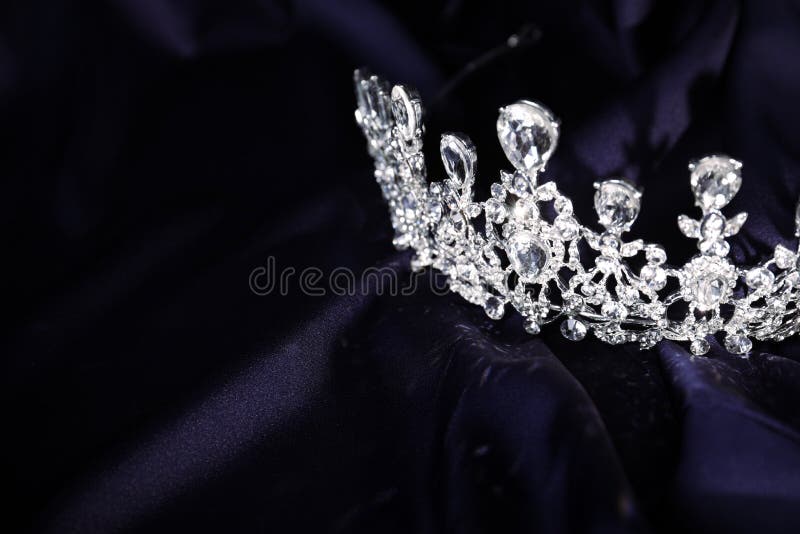 Beautiful Silver Tiara with Diamonds on Dark Cloth. Space for Text ...