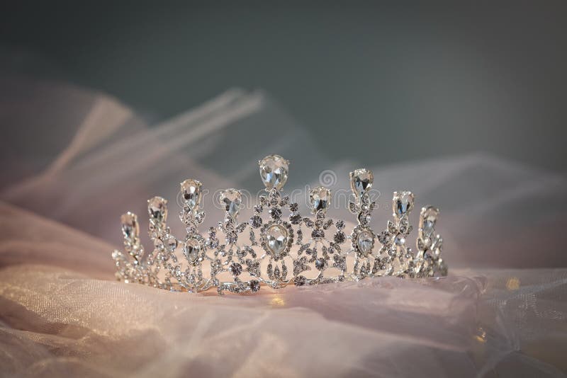 Beautiful Silver Tiara with Diamonds on Light Cloth Stock Photo - Image ...