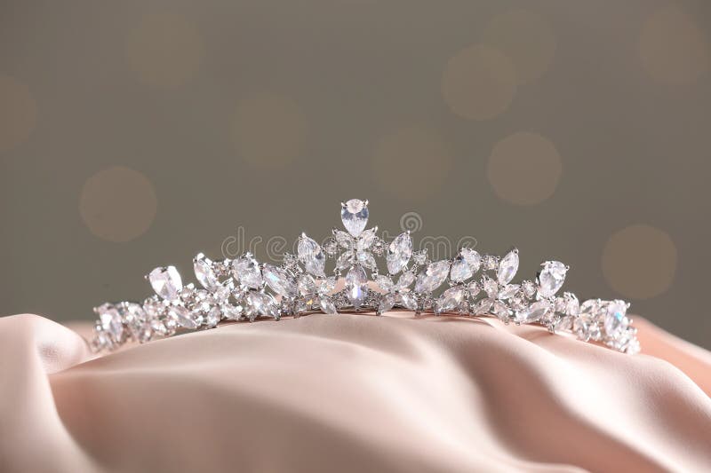 Beautiful Silver Tiara with Diamonds on Light Cloth Stock Photo - Image ...