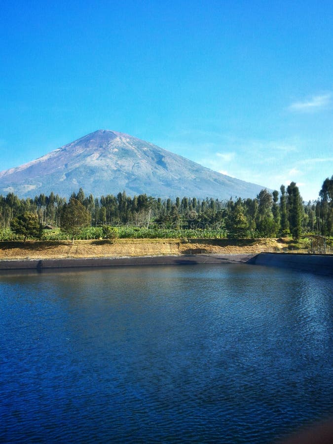 Beautiful Sindoro Mountain with Bright Blue Sky, Mountainside Village ...