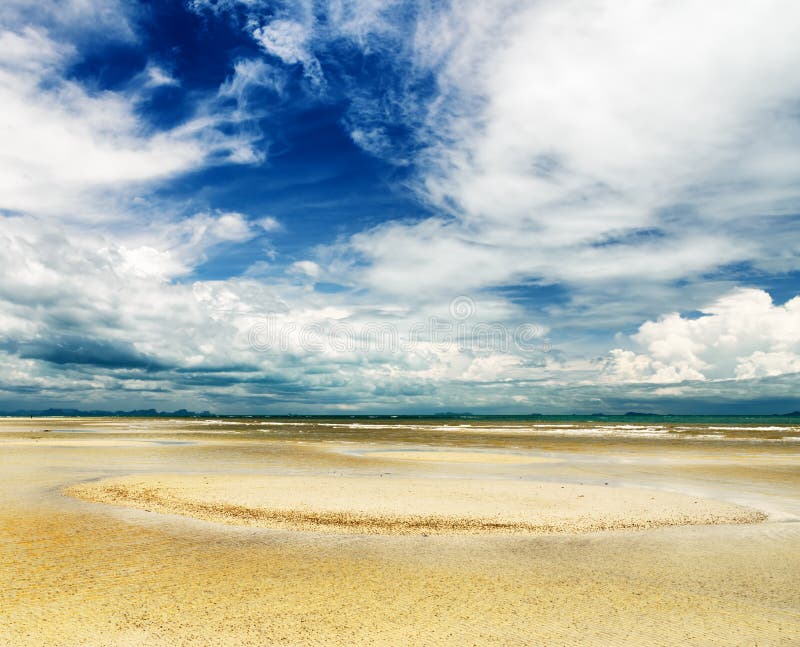 Beautiful Sky and Beach at Low Tide Stock Image - Image of storm ...