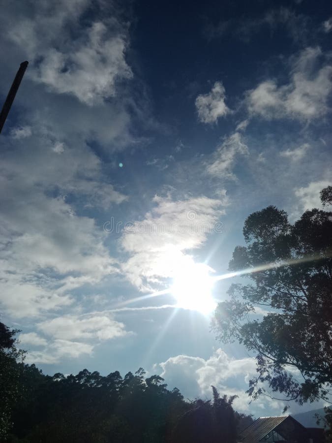 Beautiful Sky with Bright Sunlight Passing through the Clouds Stock Image - Image of clouds ...