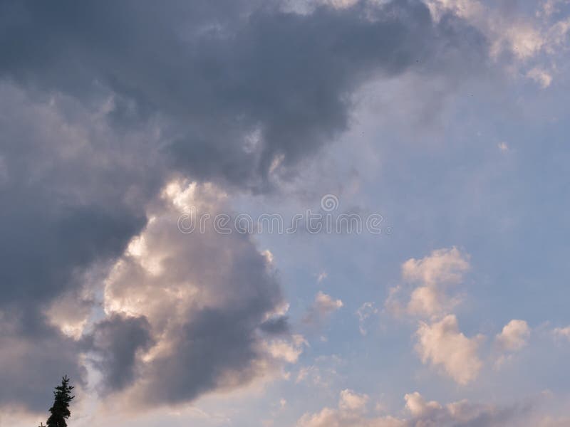 Beautiful Sky with Clouds at Sunset. Soft Light from the Setting Sun ...