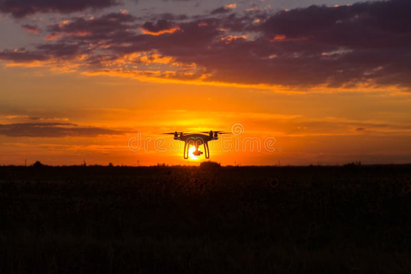 Flying Drone on the Background of a Beautiful Sunset Stock Photo ...